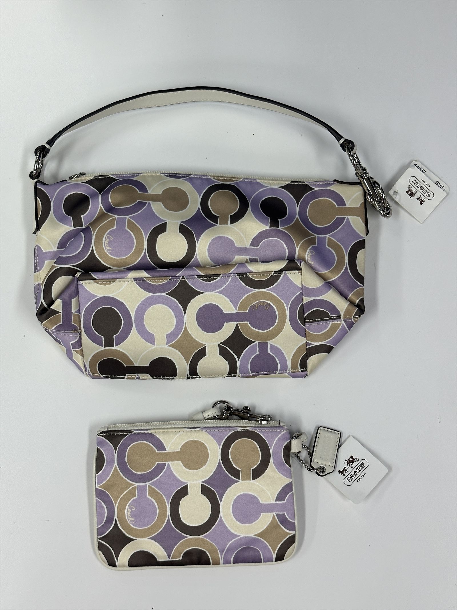 Buy Set of Lilac Pochette and Wrislet | Coach | GlamCorner