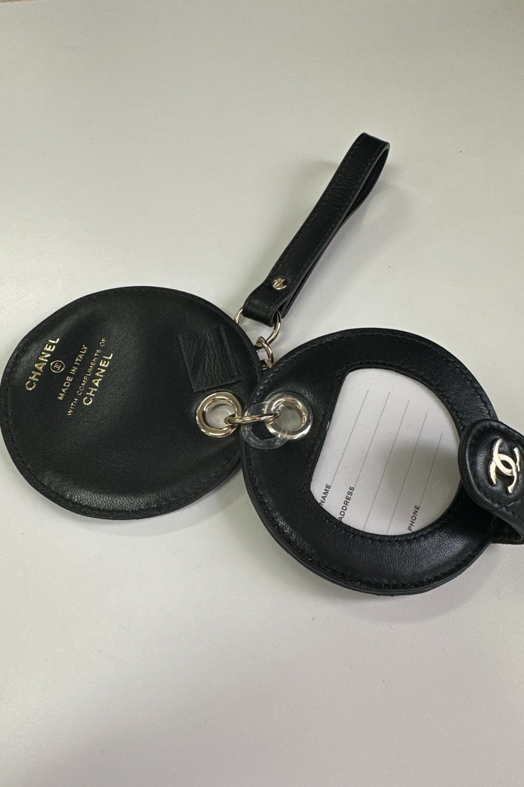 Buy Leather Luggage Tag in Black | Chanel | GlamCorner